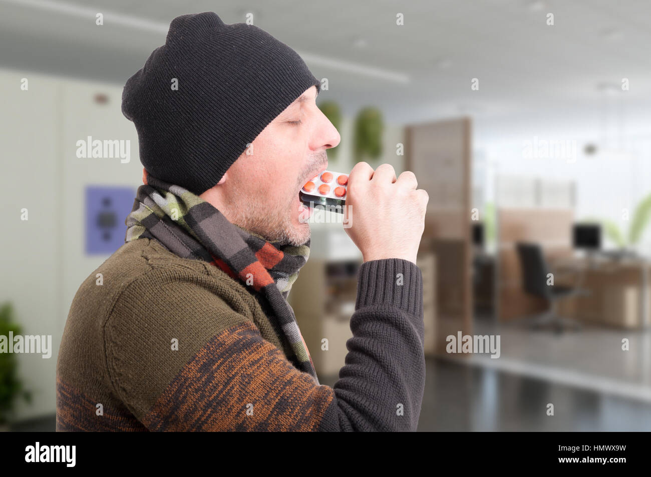 Drug abuse or addiction concept with sick man biting blister with pills ...