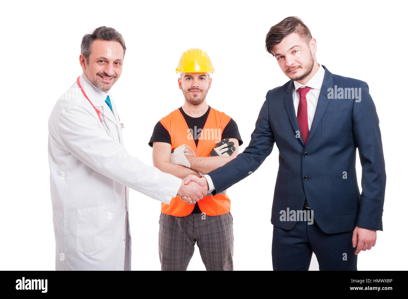 Medic and businessman doing handshake gesture while builder standing in ...