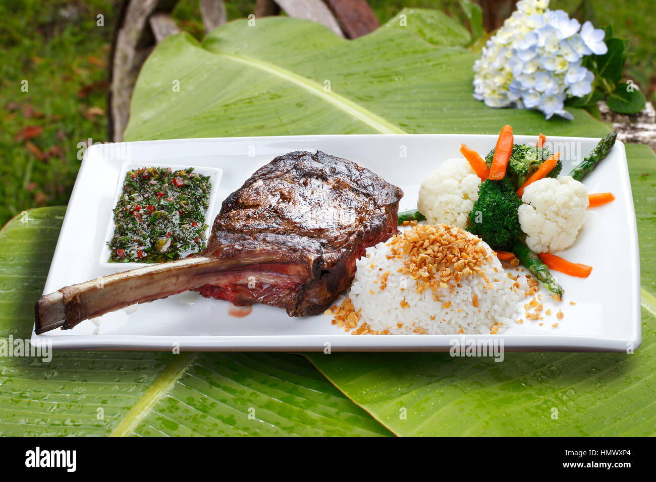 Prime rib with fries and salad Stock Photo - Alamy
