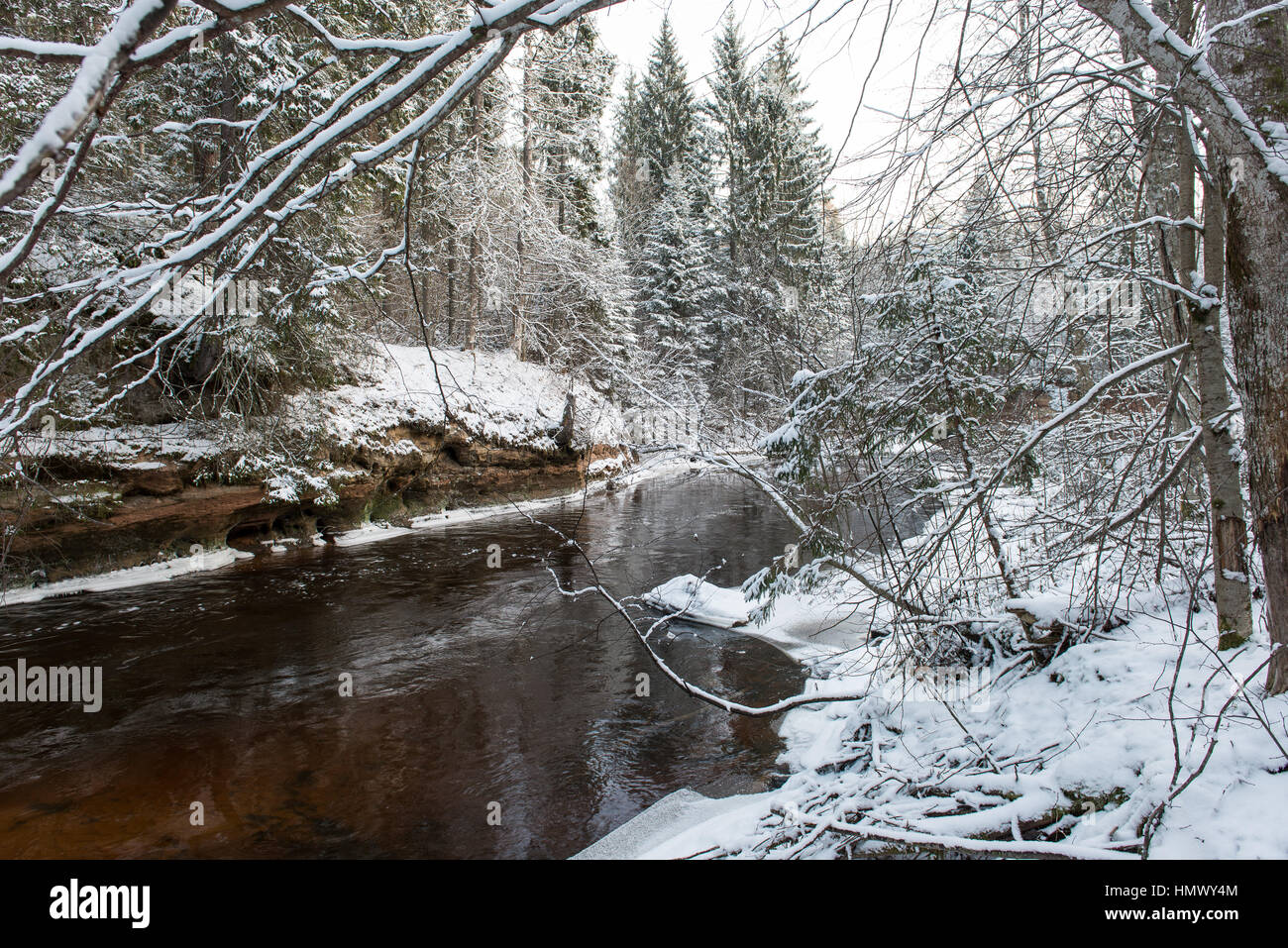 Frozen winter river landscape with ice and snow Stock Photo - Alamy