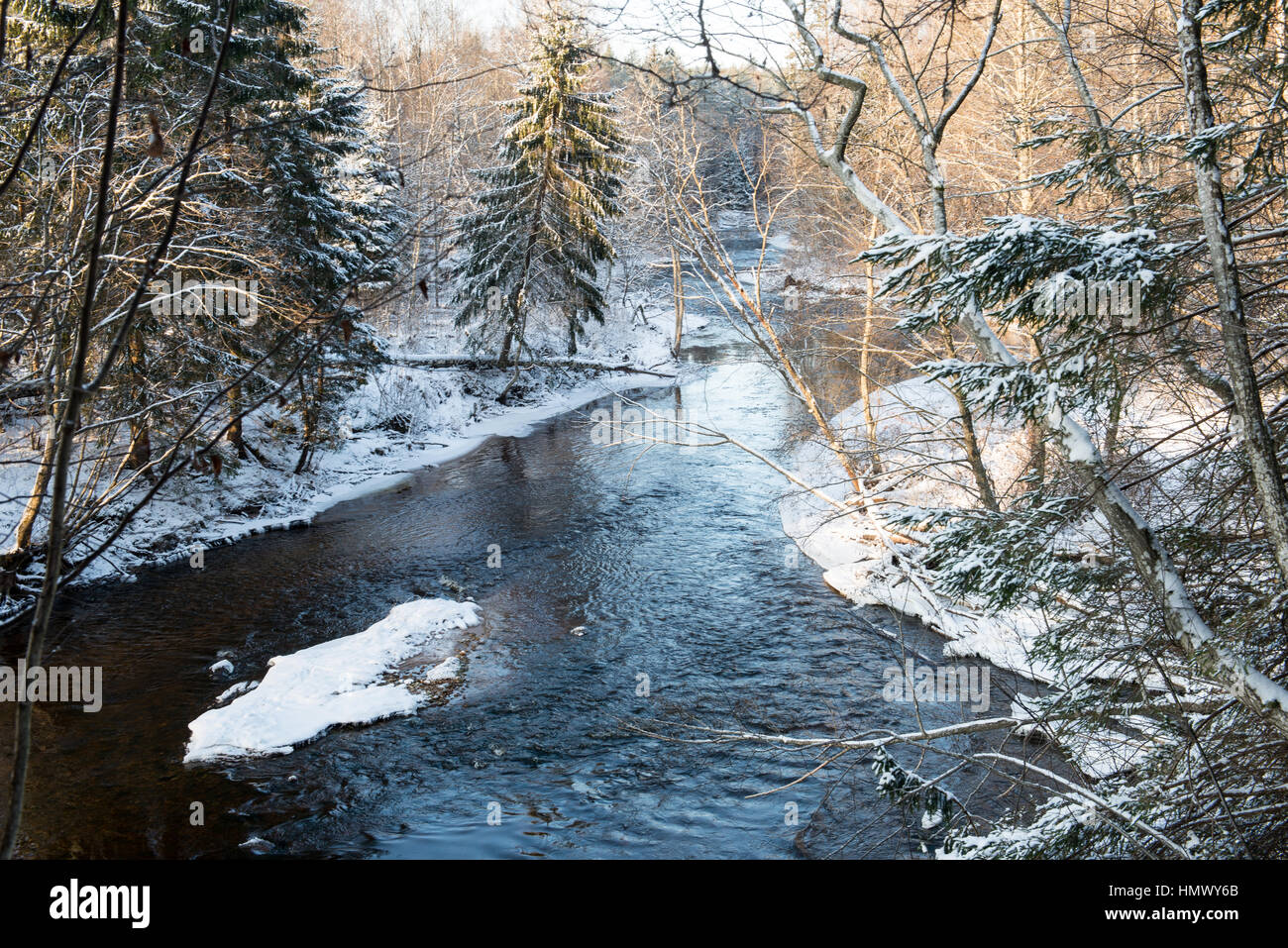 Frozen winter river landscape with ice and snow Stock Photo - Alamy