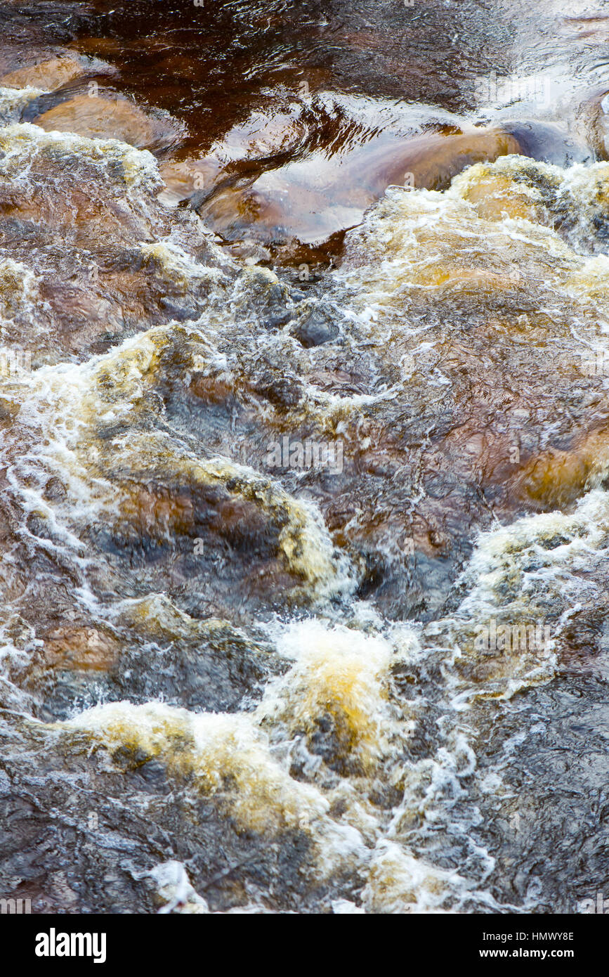 abstract frozen ice textures in the forest country river in winter ...