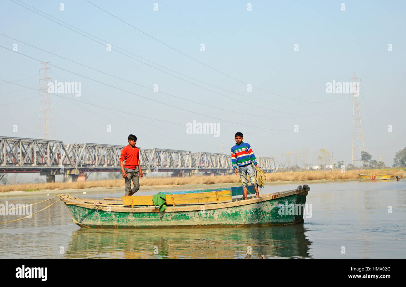 Indian Boys fishing in the Ganges River Stock Photo - Alamy