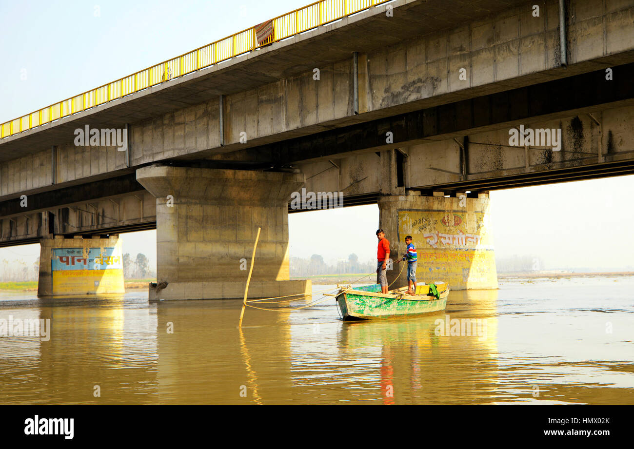 Indian Boys fishing in the Ganges River Stock Photo - Alamy