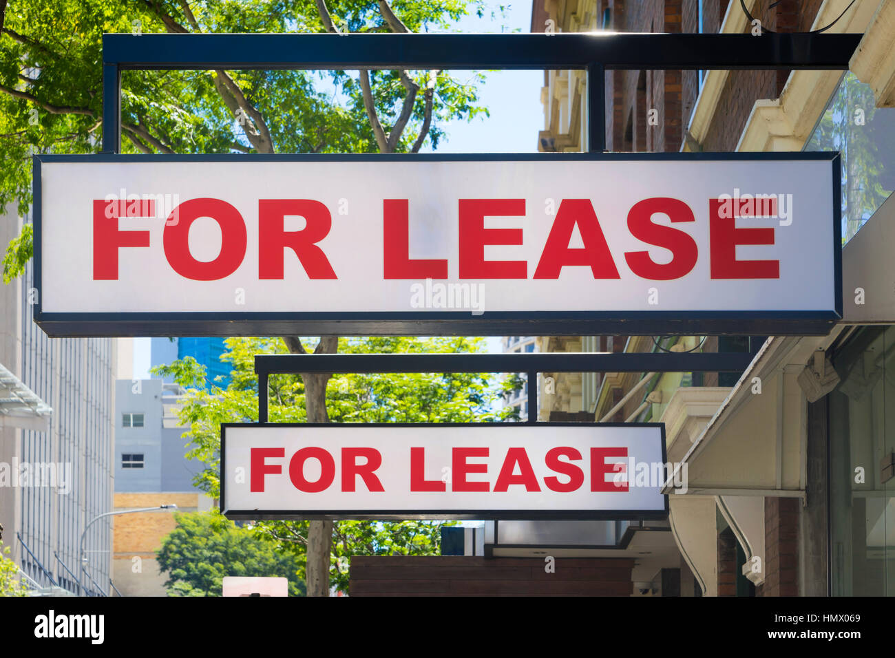 For Lease signs on display outside buildings Stock Photo - Alamy