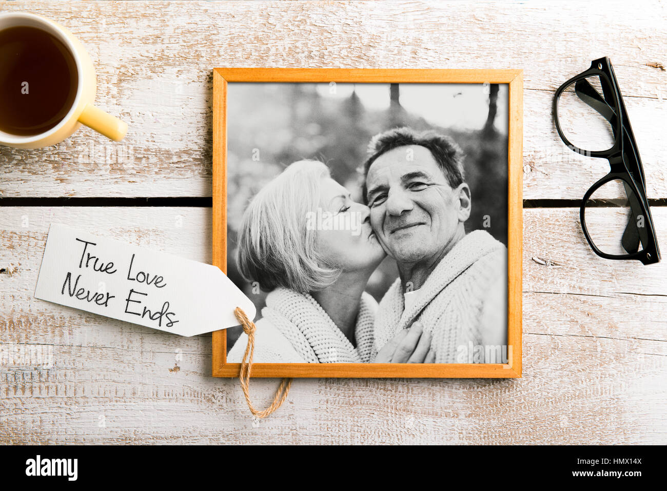 Black-and-white photo of seniors in picture frame. Studio shot Stock ...