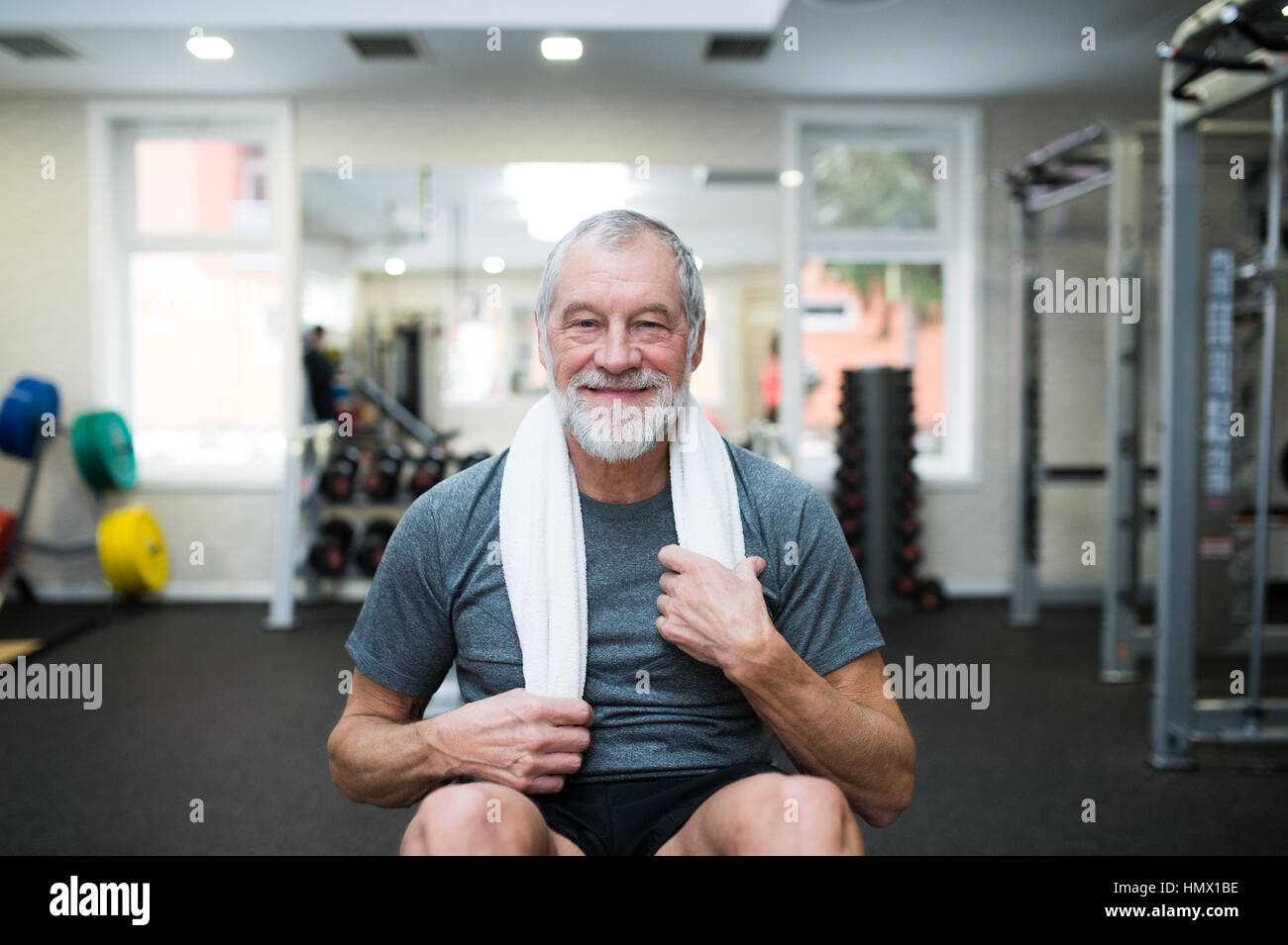 Fit senior man resting after working out Stock Photo - Alamy