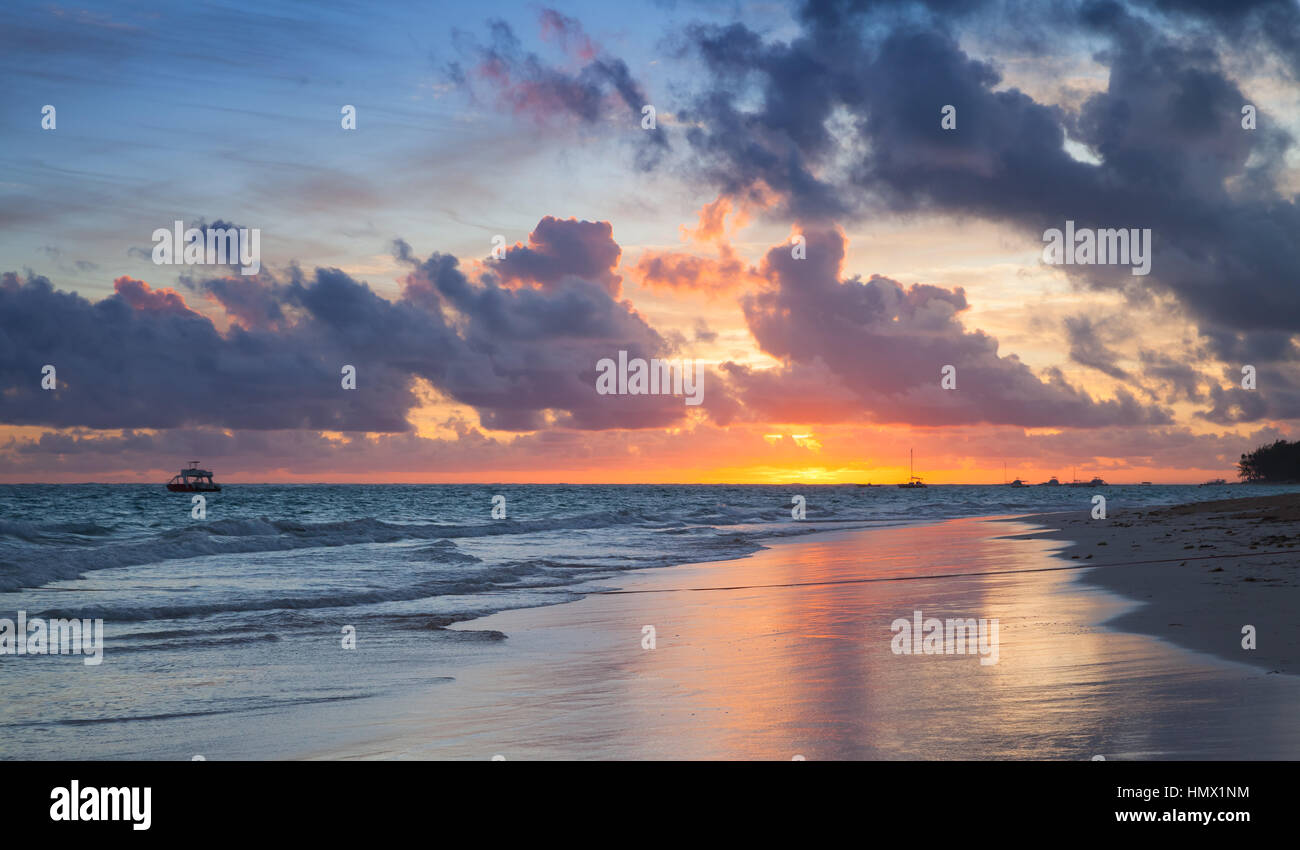 Colorful sunrise over Atlantic Ocean coast, Bavaro beach, Hispaniola ...