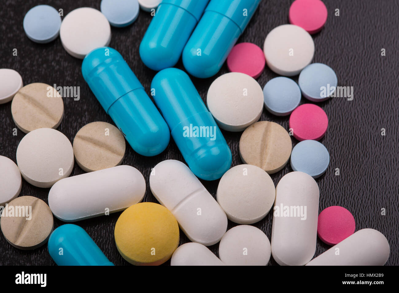 different tablets pills capsule heap mix therapy drugs Stock Photo - Alamy