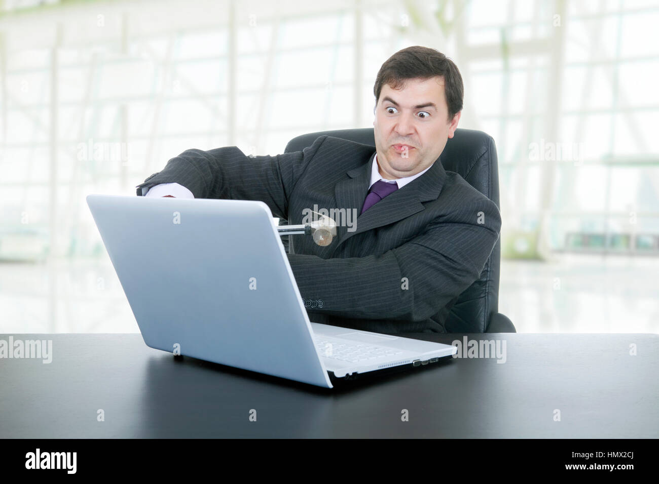 Man smashing computer with hammer hi-res stock photography and images ...