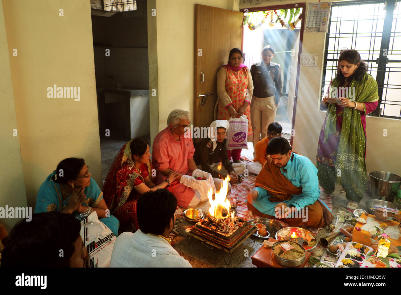 Hindu people offering special spiritual prayer to god Stock Photo - Alamy
