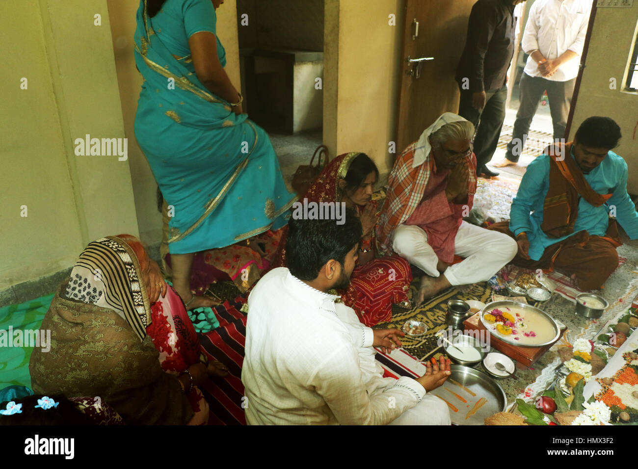 Hindu people offering special spiritual prayer to god Stock Photo - Alamy