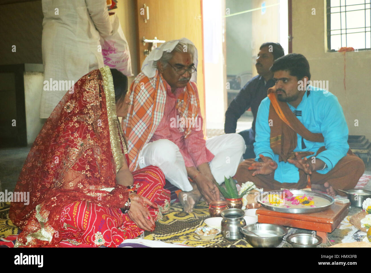 Hindu people offering special spiritual prayer to god Stock Photo - Alamy