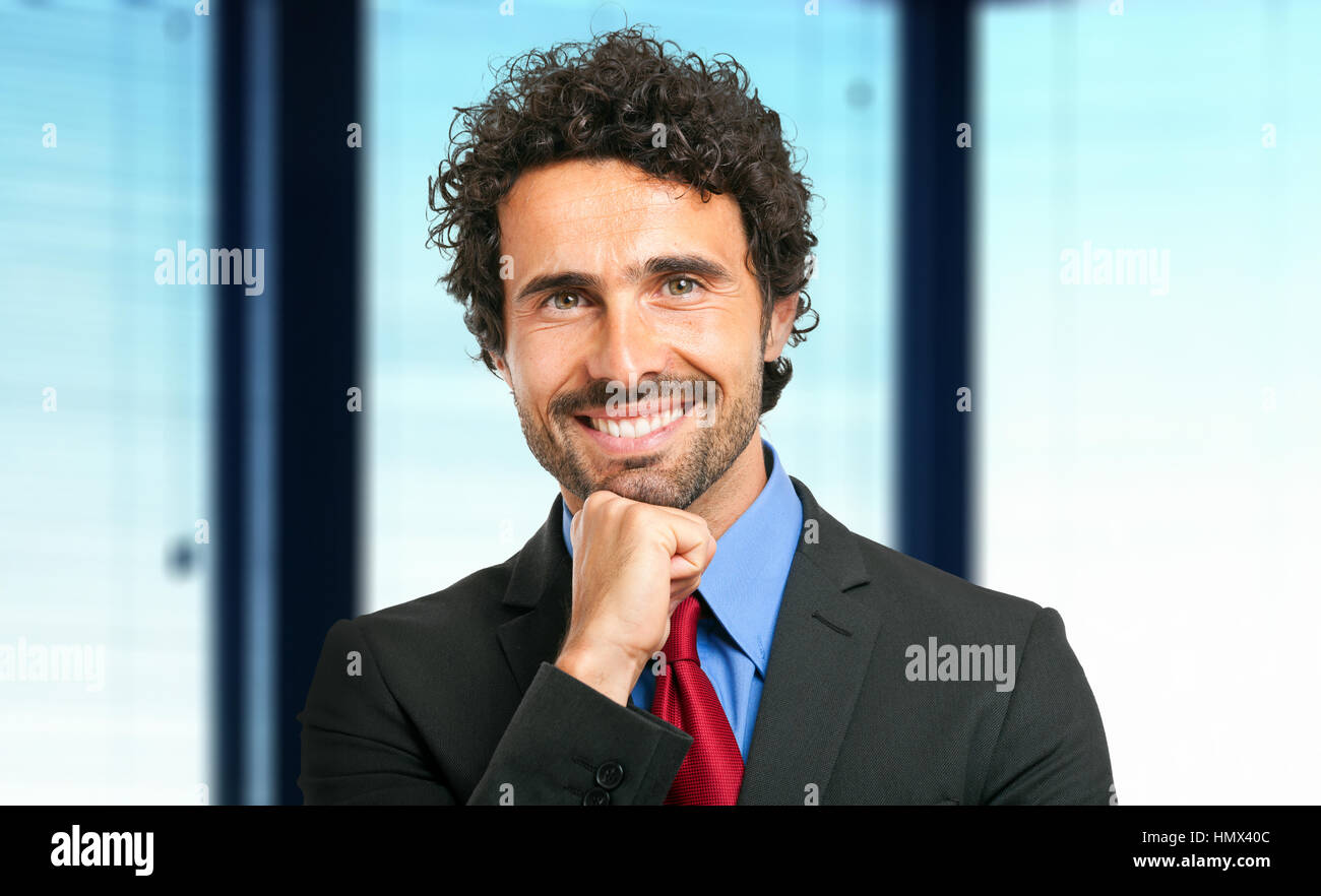 Friendly male manager portrait Stock Photo - Alamy
