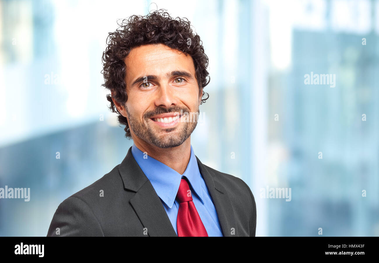 Handsome businessman portrait Stock Photo - Alamy