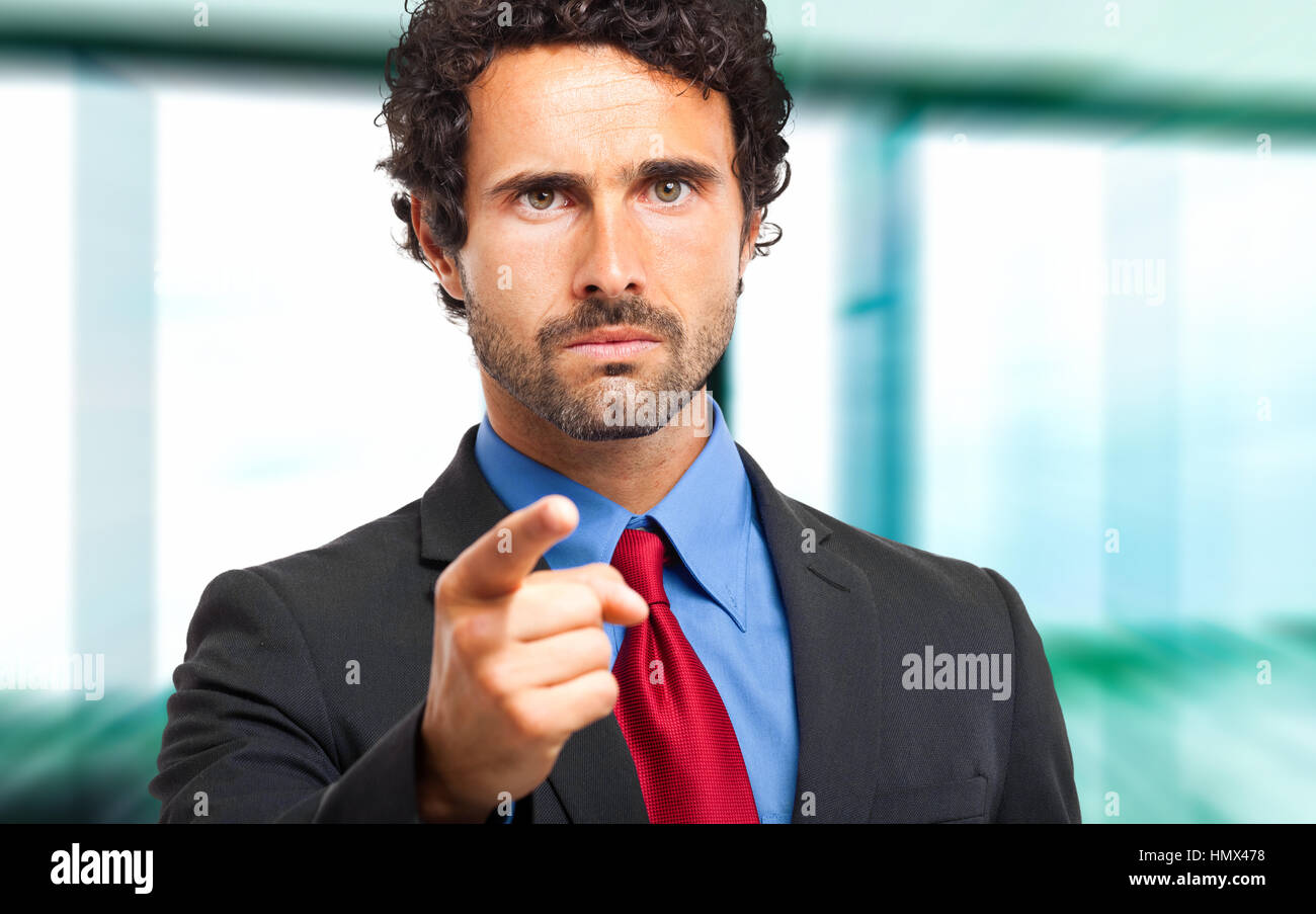 Confident male manager pointing his finger at you Stock Photo - Alamy