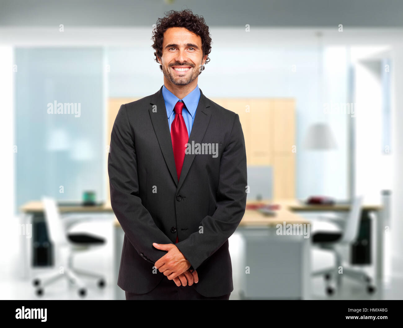 Handsome smiling manager closeup Stock Photo - Alamy