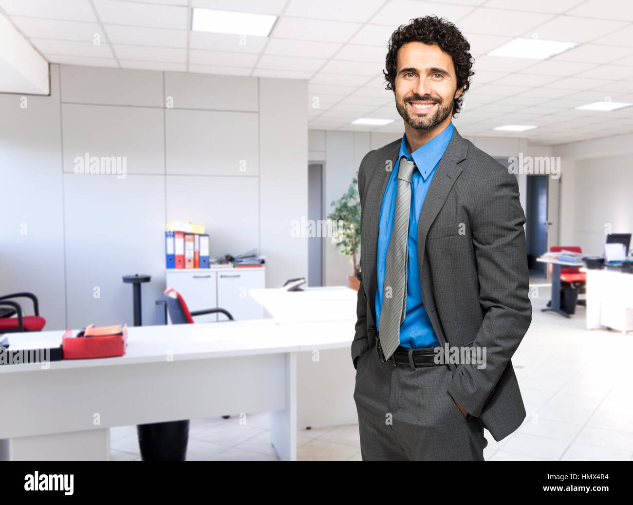 Confident male manager in his office Stock Photo - Alamy