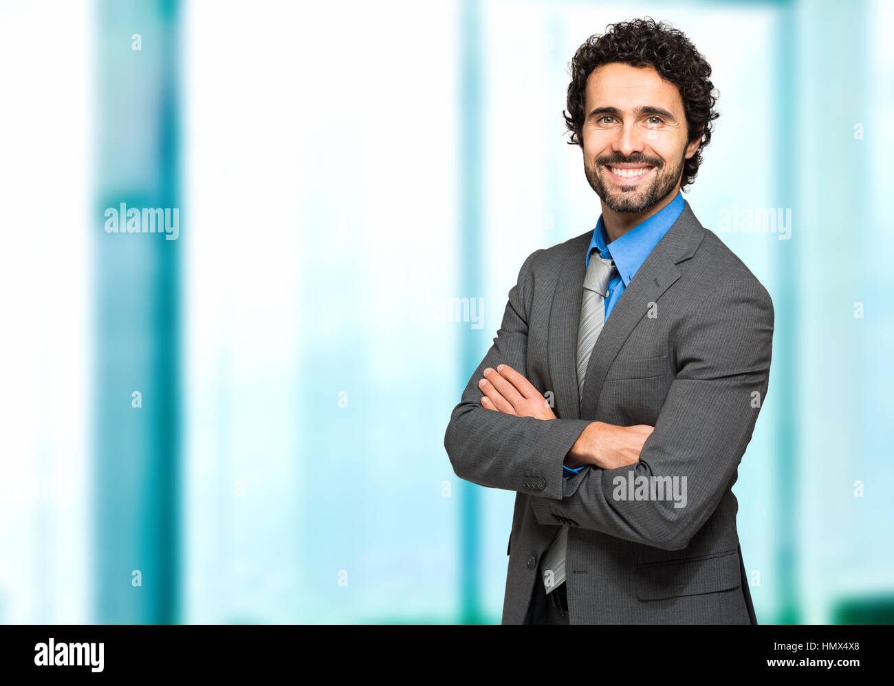 Friendly male manager portrait Stock Photo - Alamy