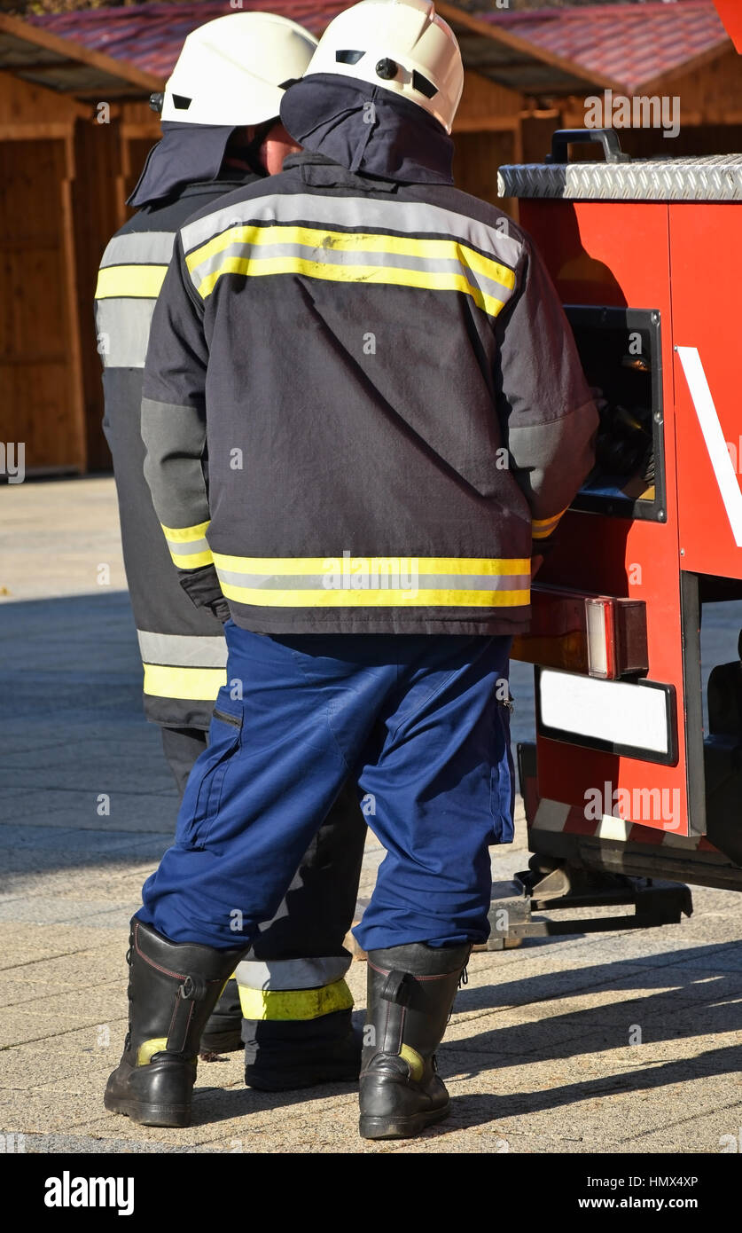 Firefighters at work outdoors Stock Photo - Alamy