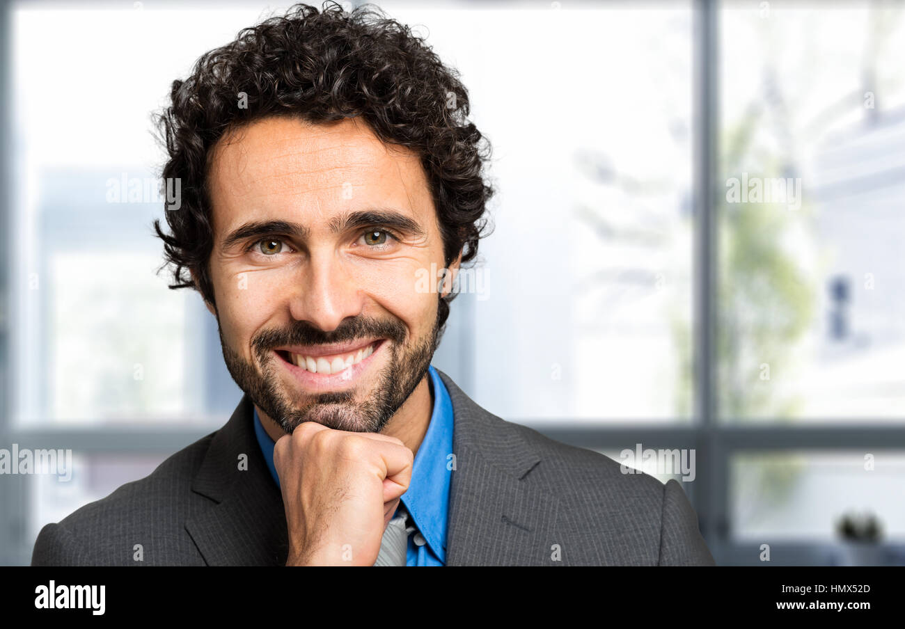 Portrait of a smiling business man Stock Photo - Alamy