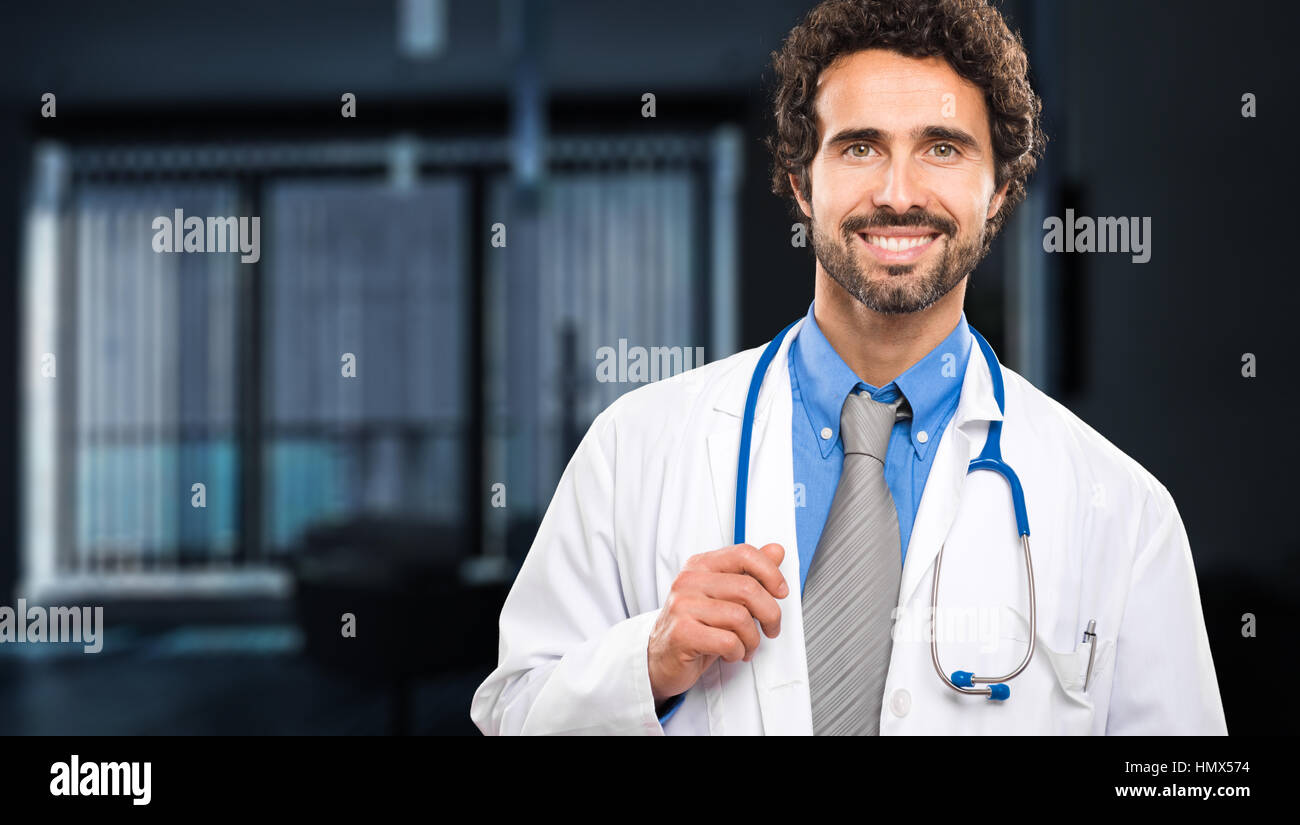Handsome doctor portrait hi-res stock photography and images - Alamy