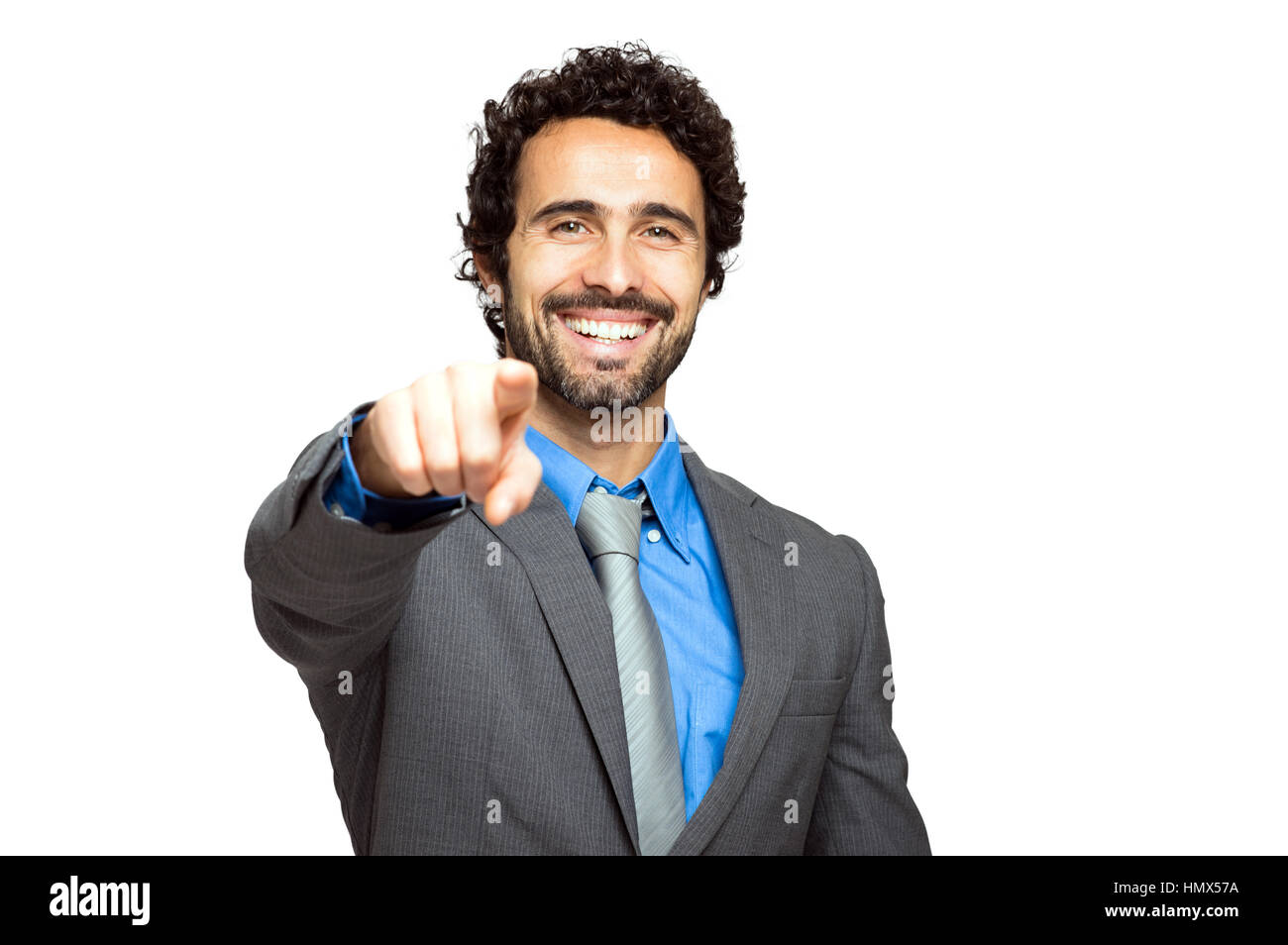 Smiling man pointing at you Stock Photo - Alamy