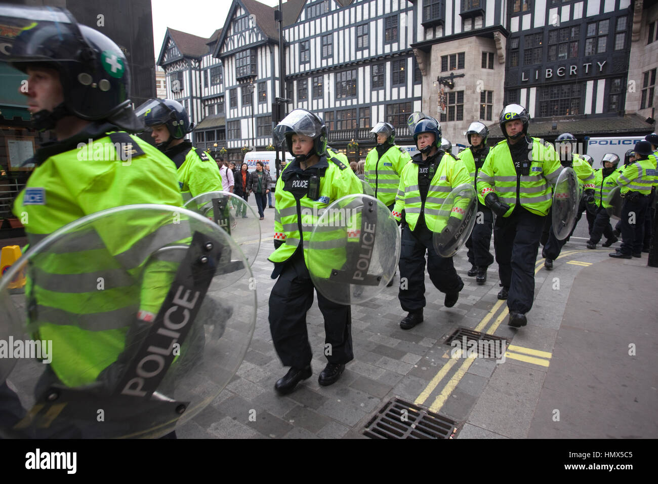Metropolitan Riot Police on the streets of London during a students ant ...