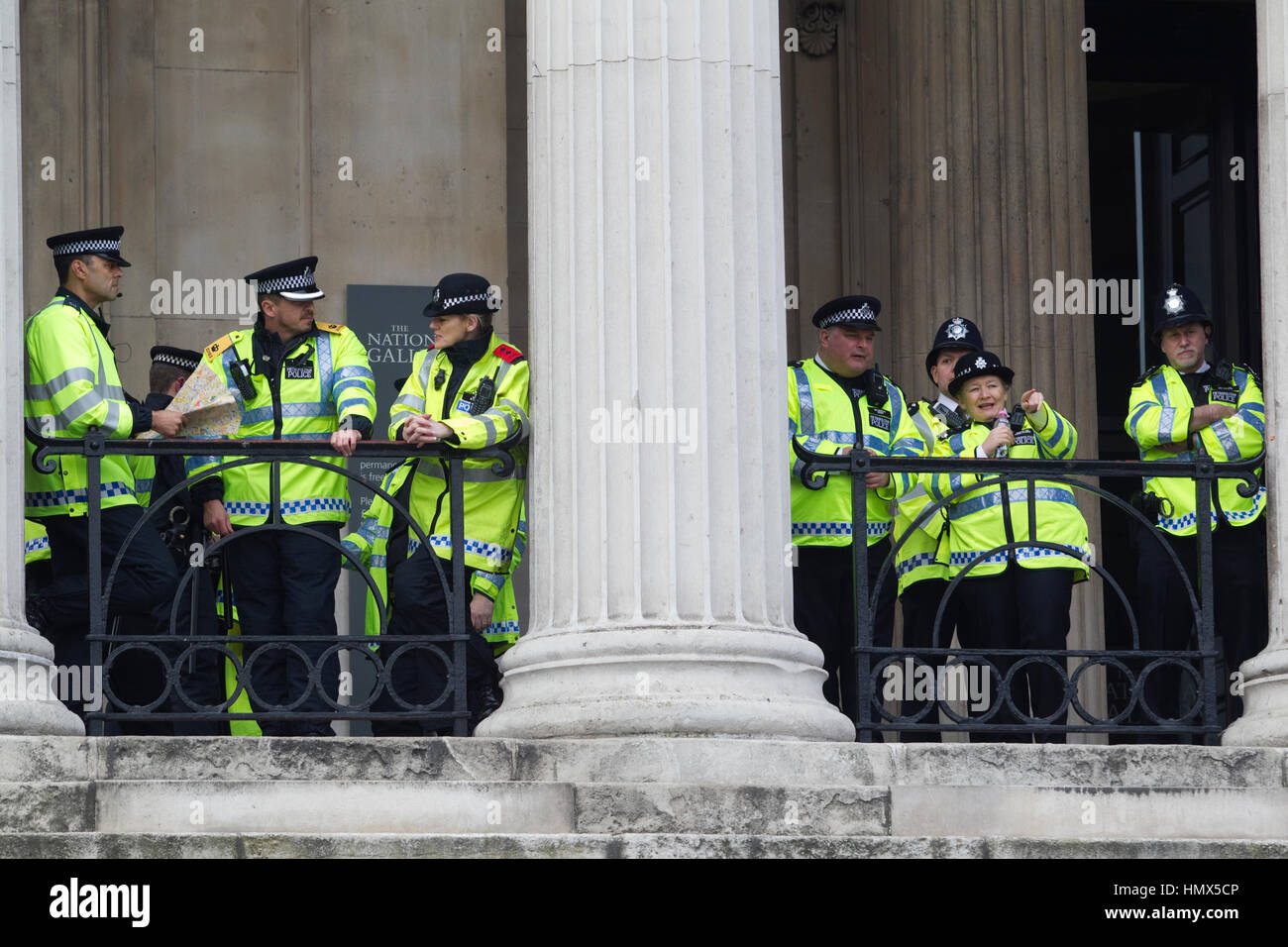 Metropolitan police on duty during an anti-cuts protest in Central ...