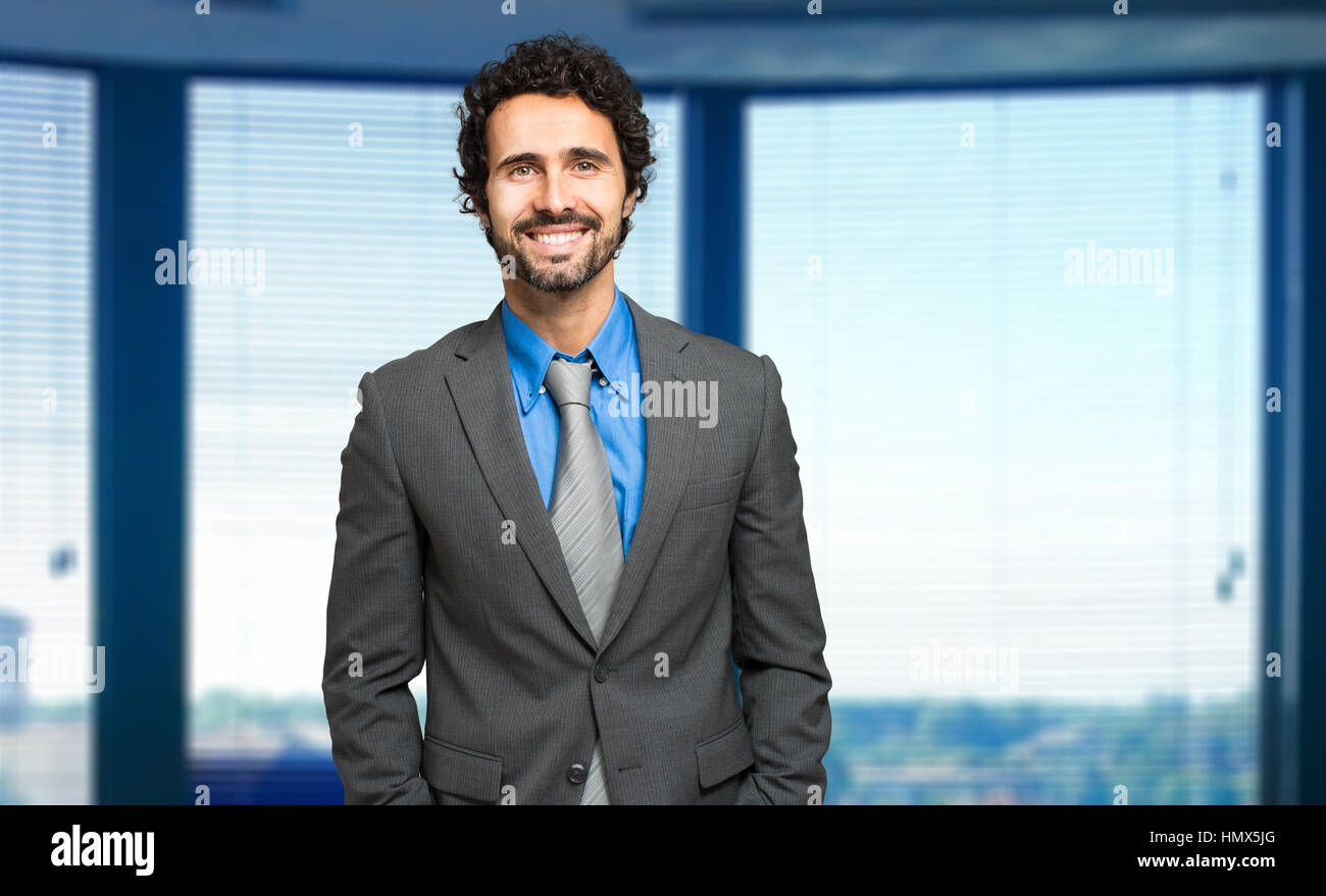 Handsome male manager in his office Stock Photo - Alamy