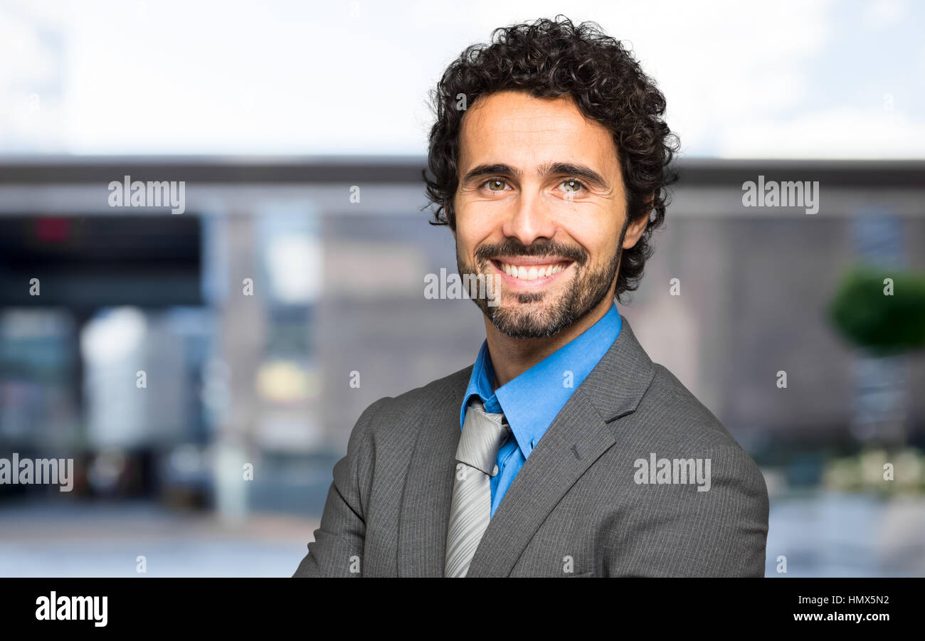 Handsome male manager portrait Stock Photo - Alamy