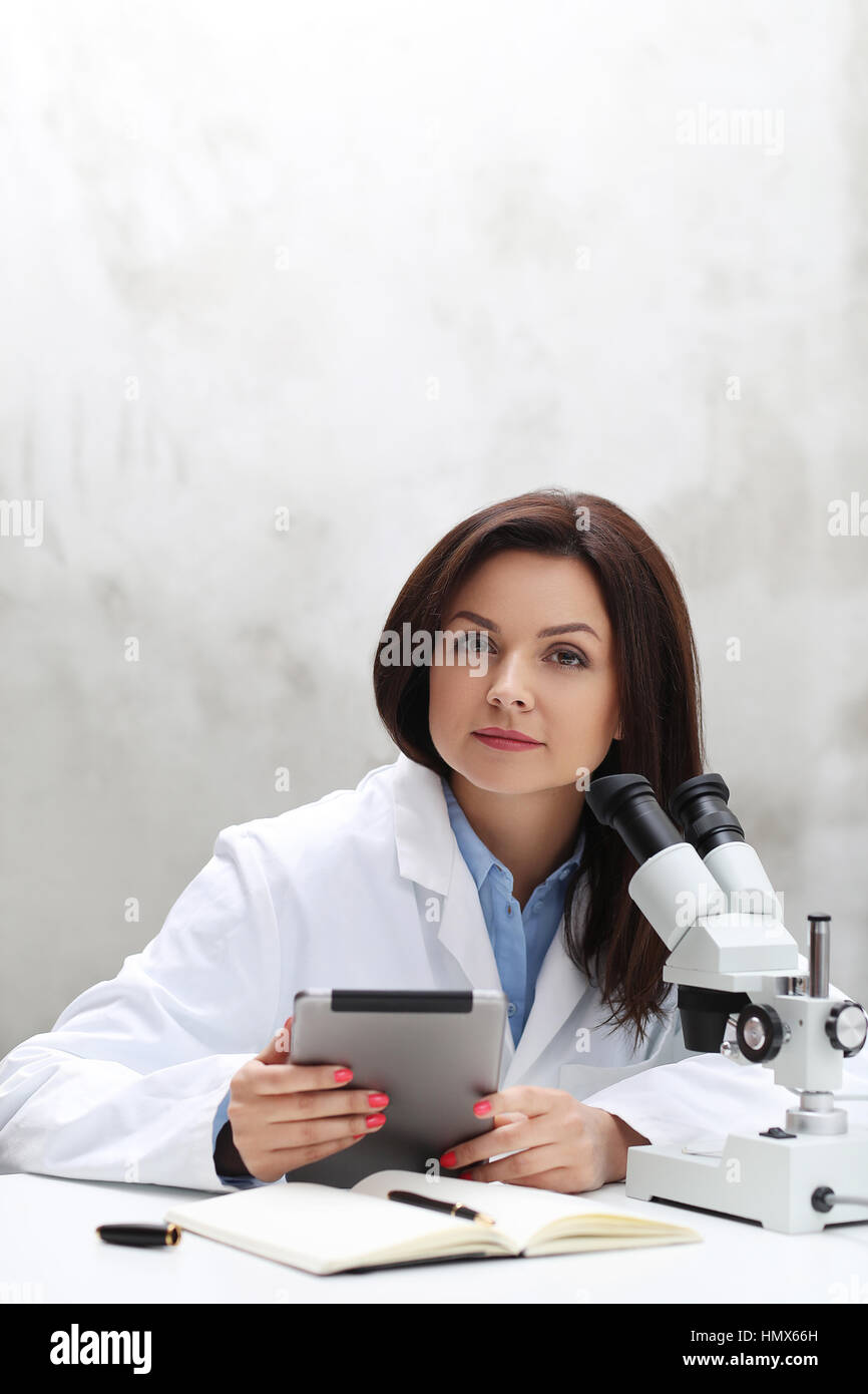 Scientist modern microscope table hi-res stock photography and images ...