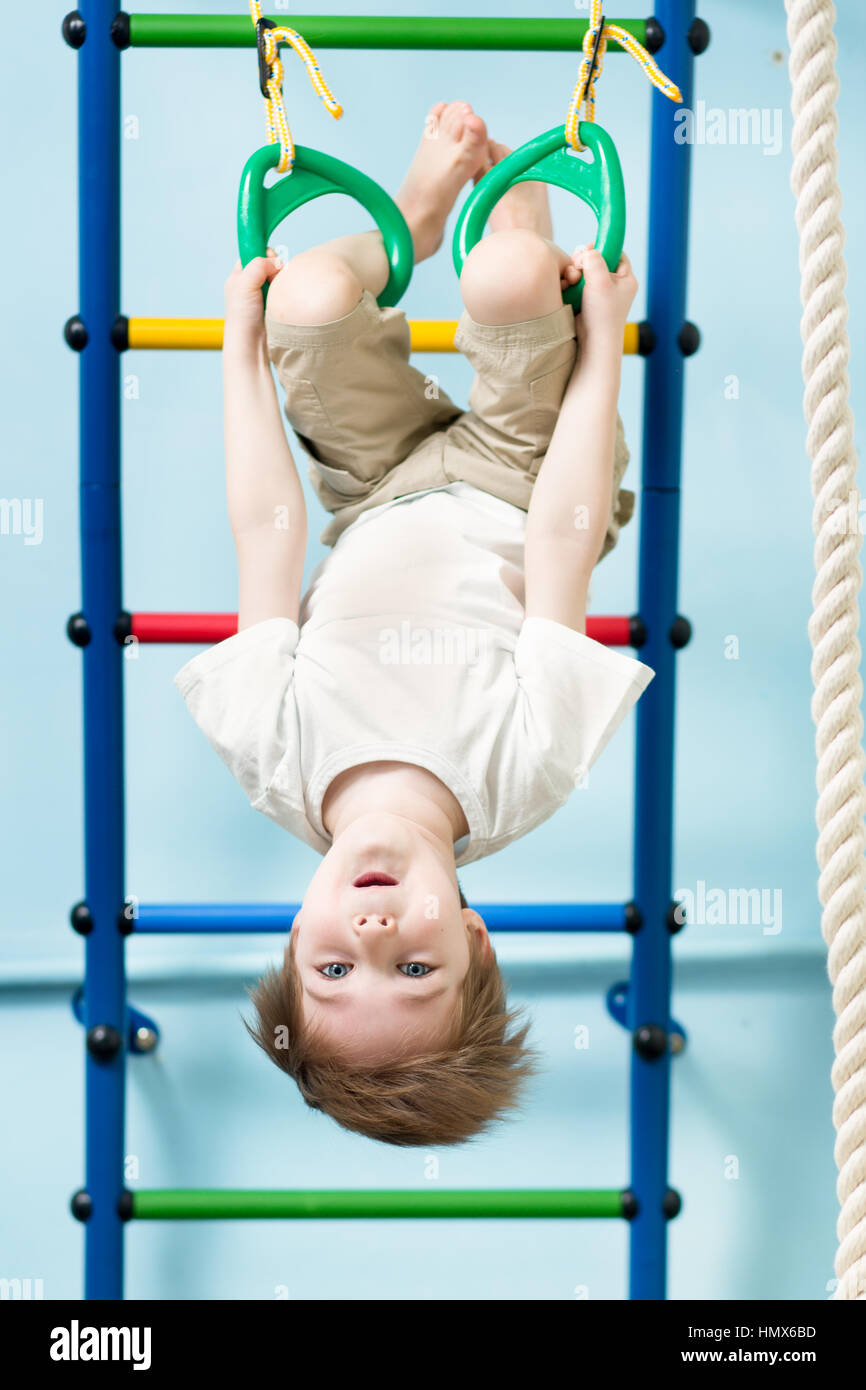 Male gymnast on rings hi-res stock photography and images - Alamy