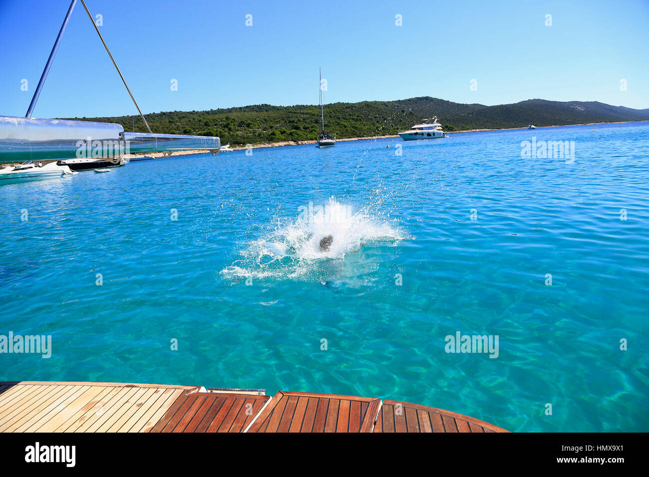 splash after jumping into the water from a boat. Leisure and ...