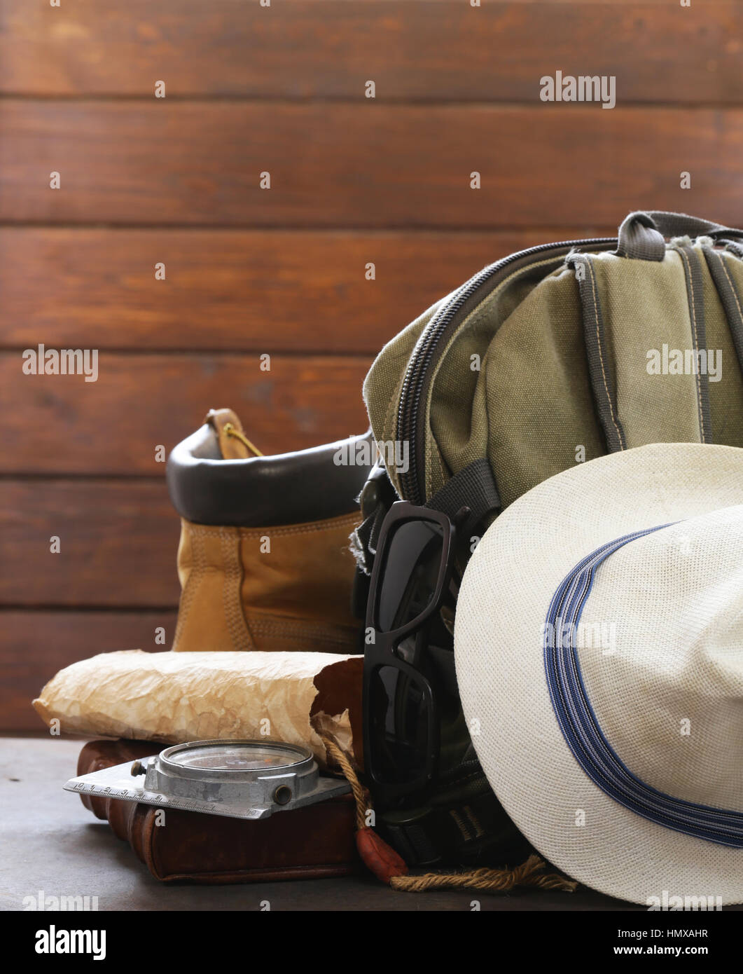 travel concept - backpack, compass, map and accessories Stock Photo - Alamy