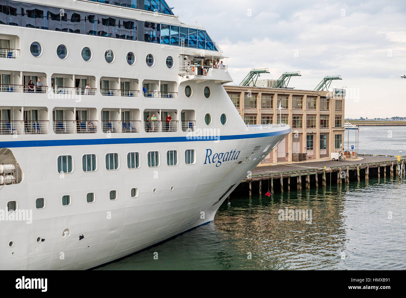 Windows, verandas and decks on the side of a massive luxury cruise ship ...