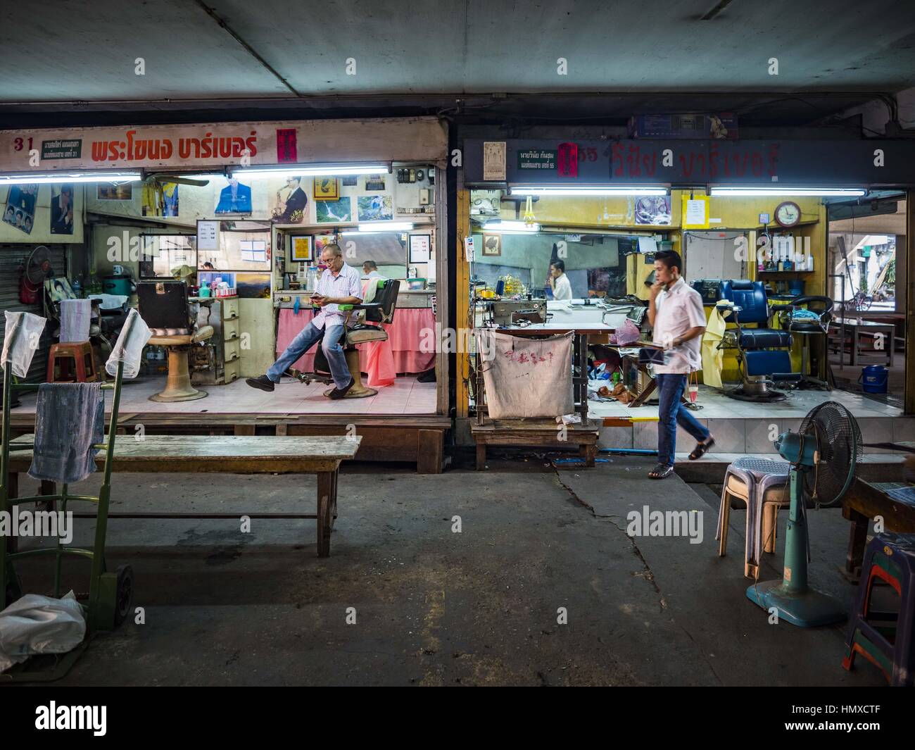 Bangkok, Bangkok, Thailand. 6th Feb, 2017. A man walks past some of the ...