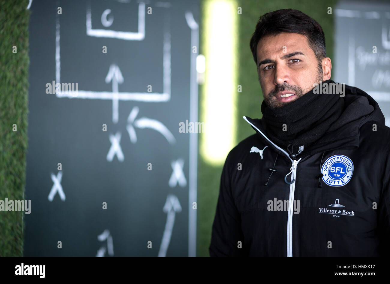Lotte's coach Ismail Atalan stands next to a tactical board Lotte ...