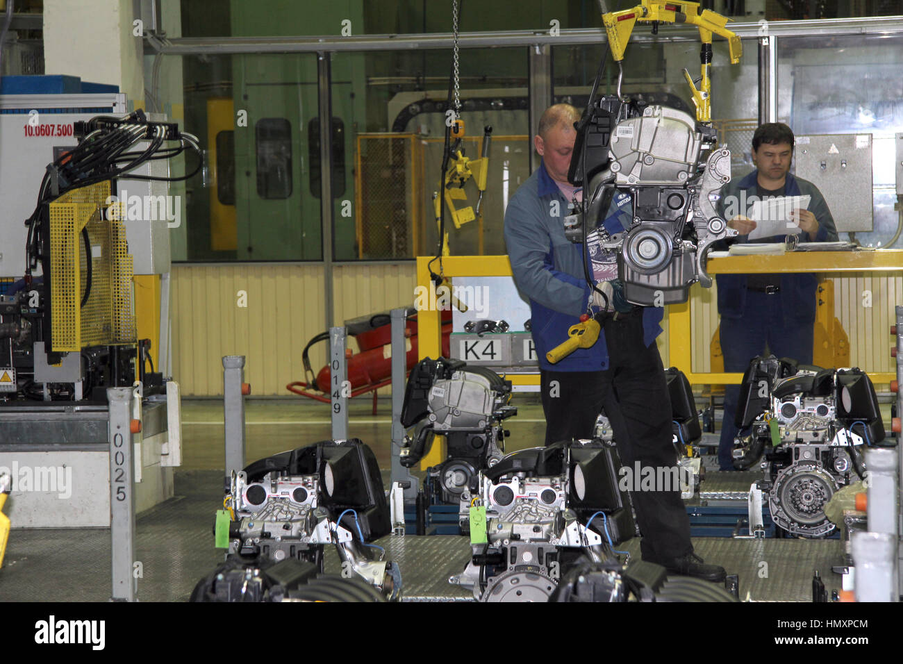 Workers on the Lada production line in the Russian car manufacturer ...