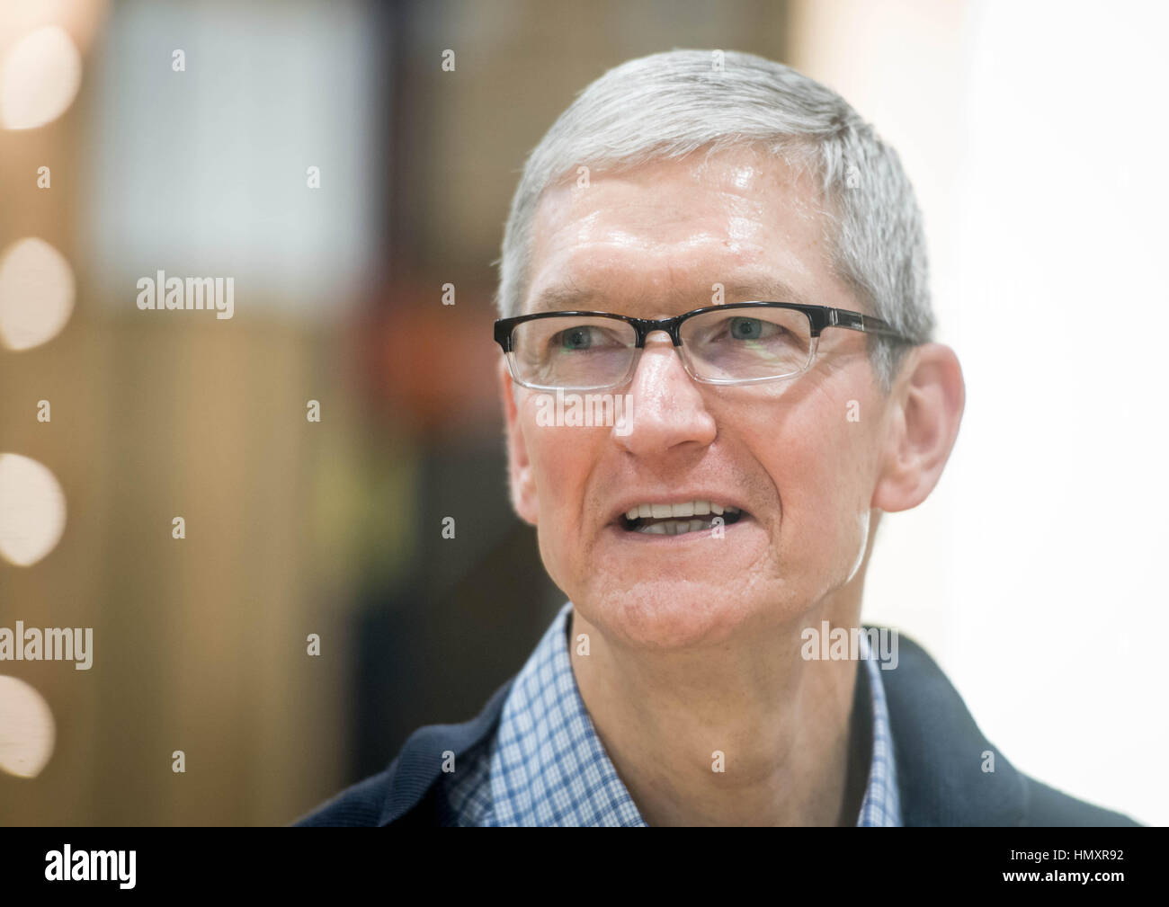 Apple CEO Tim Cook in a production hall belonging to shop fittings ...
