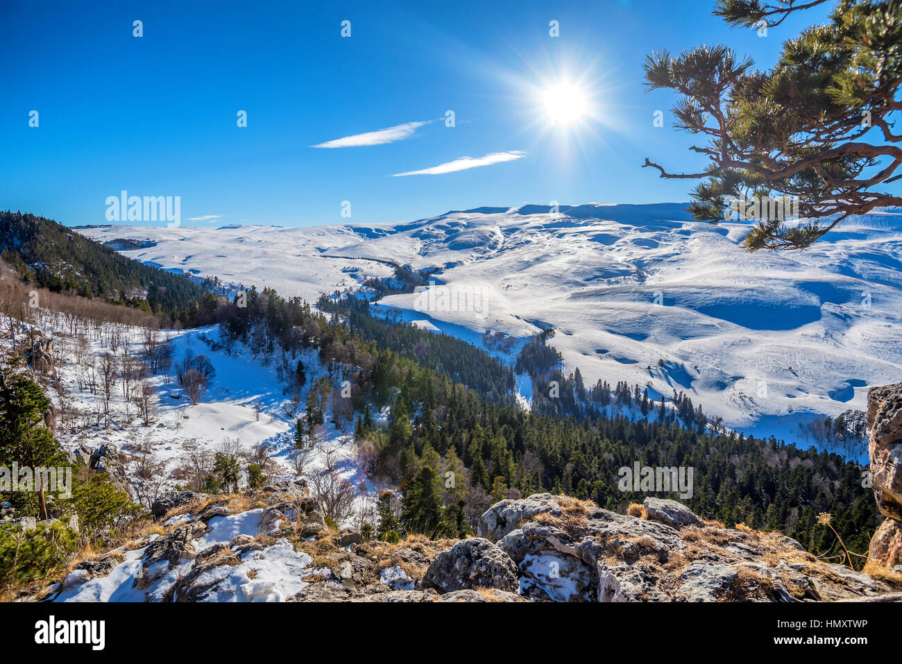 Winter mountains panorama of scenic view of snow on tops of rocks and ...