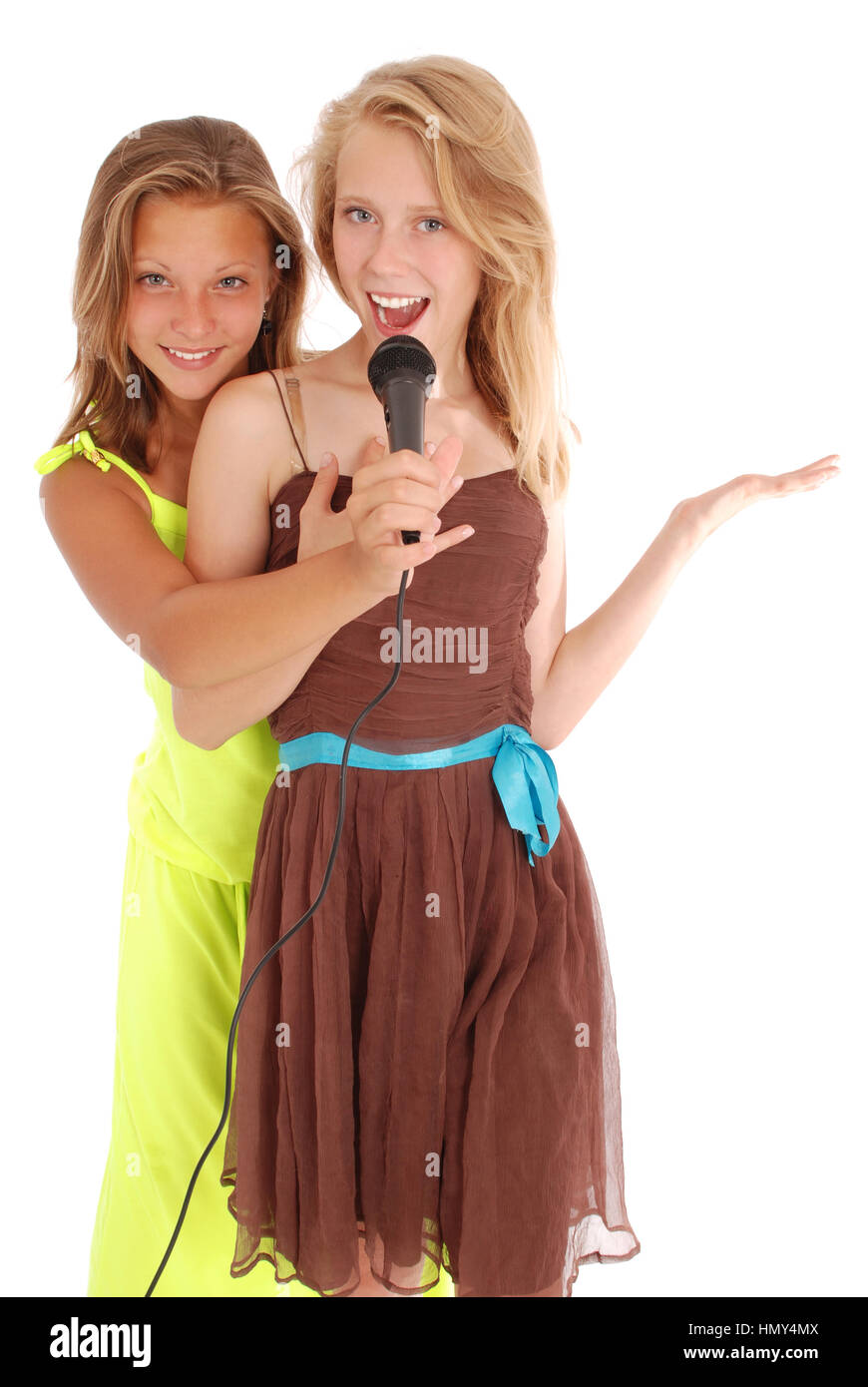 Young beautiful teenage girl conducts interviews with the singer ...