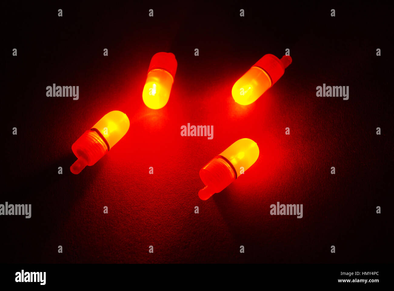 Fishing four red LED power indicators isolated on black background ...