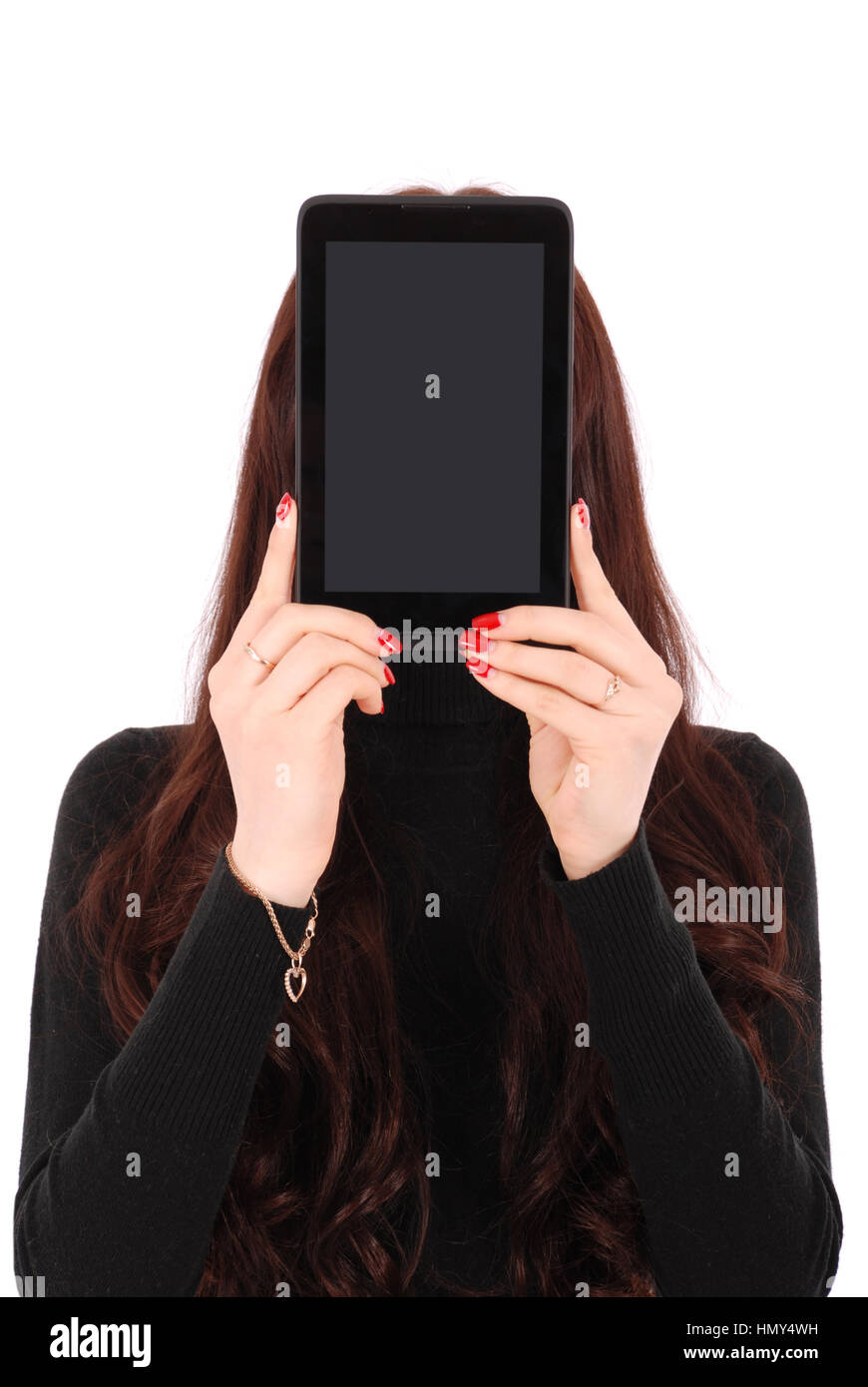 Girl keeps tablet pc the face isolated on white Stock Photo - Alamy
