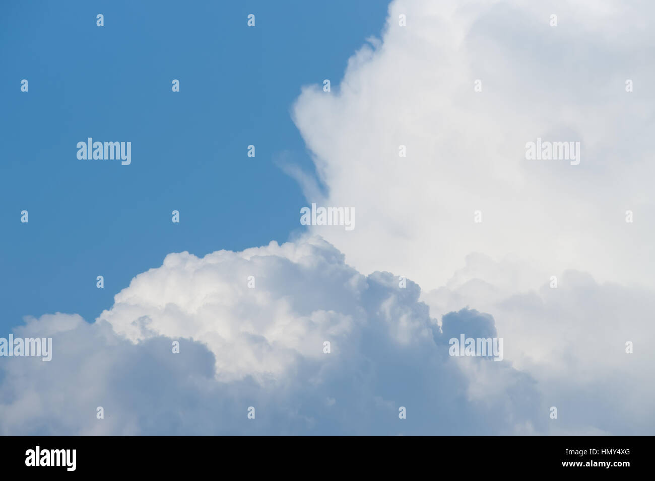 White light clouds in the clear blue sky Stock Photo - Alamy