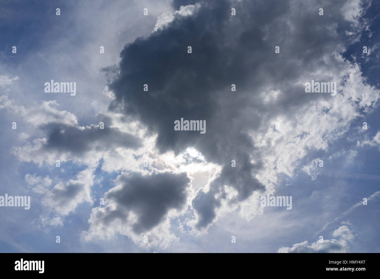 Sun shining through storm cloud hi-res stock photography and images - Alamy