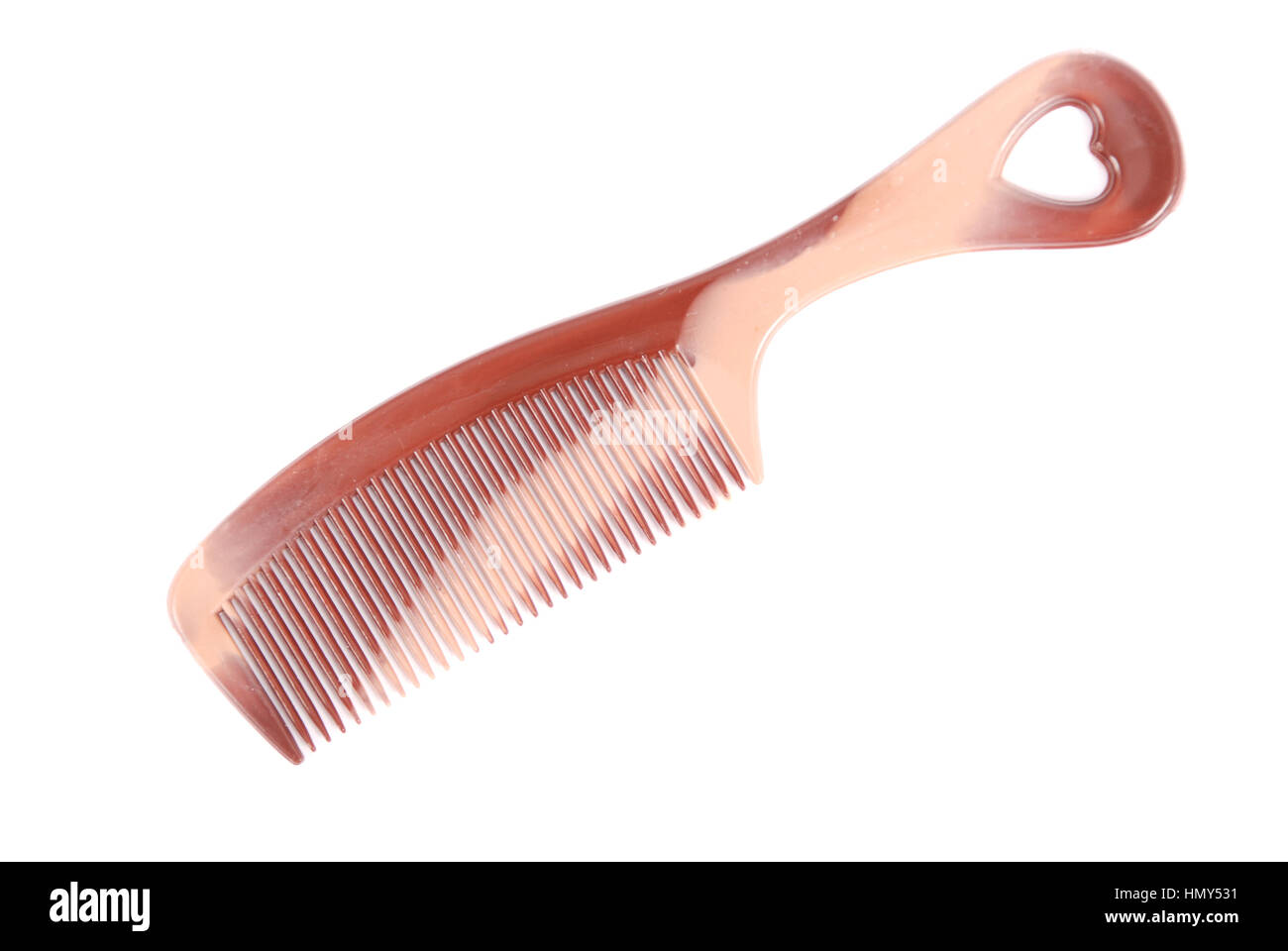 Brown plastic hair comb isolated on white background Stock Photo - Alamy