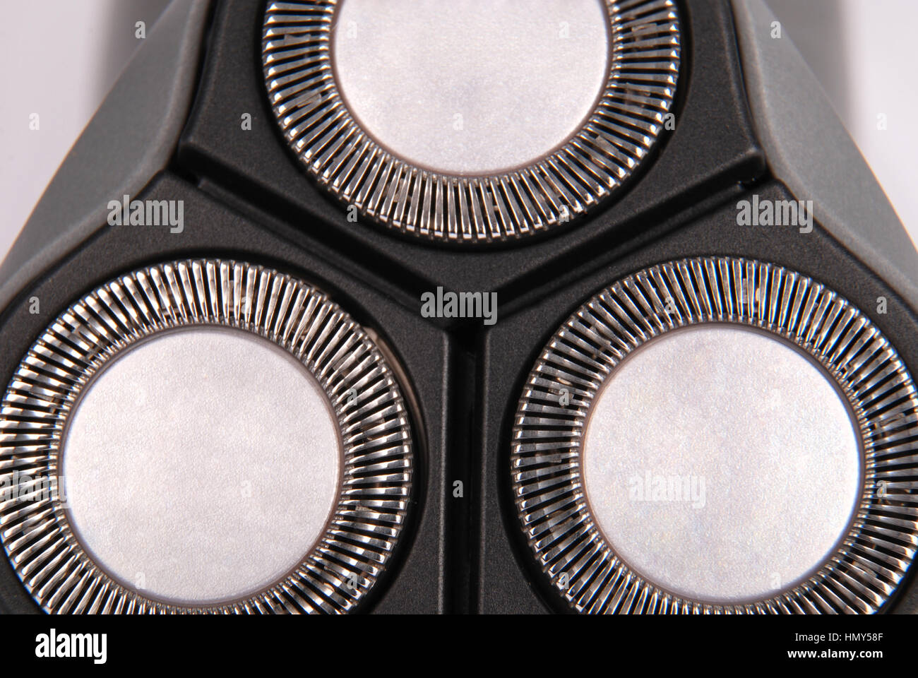 The blade head of the electric shaver background closeup Stock Photo ...
