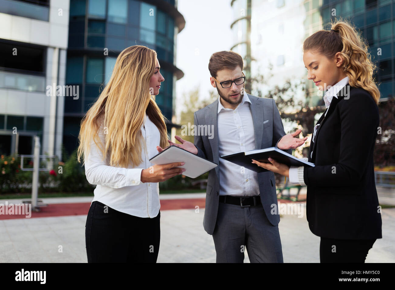 Overworked stressful businessperson too busy at work Stock Photo - Alamy