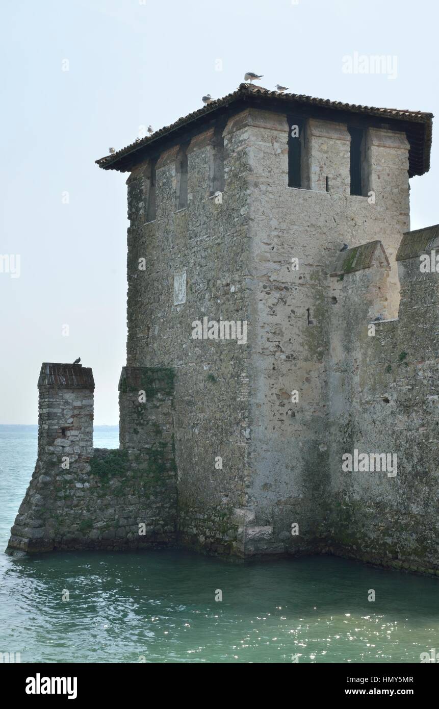 Tower of medieval port fortification at Sirmione on lake Garda, Italy ...